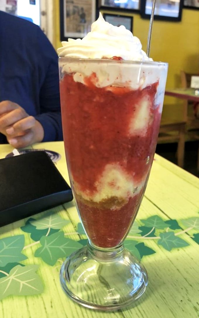 This strawberry parfait isn't just dessert—it's edible artwork. The whipped cream crown makes it look like royalty, which in the dessert kingdom, it certainly is.