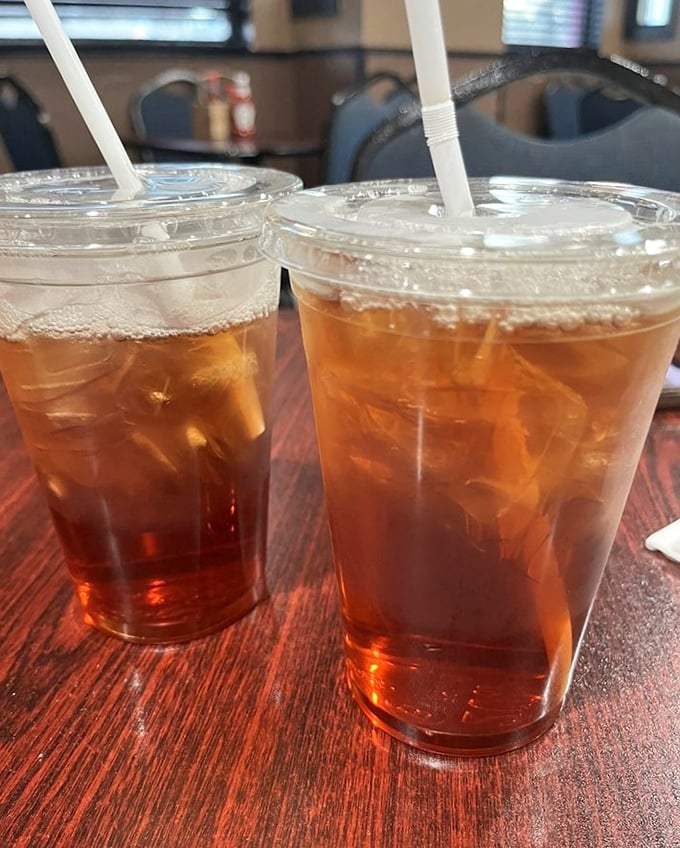 Sweet tea in generous cups – the house wine of the South, served properly chilled and sweet enough to make your dentist wince.