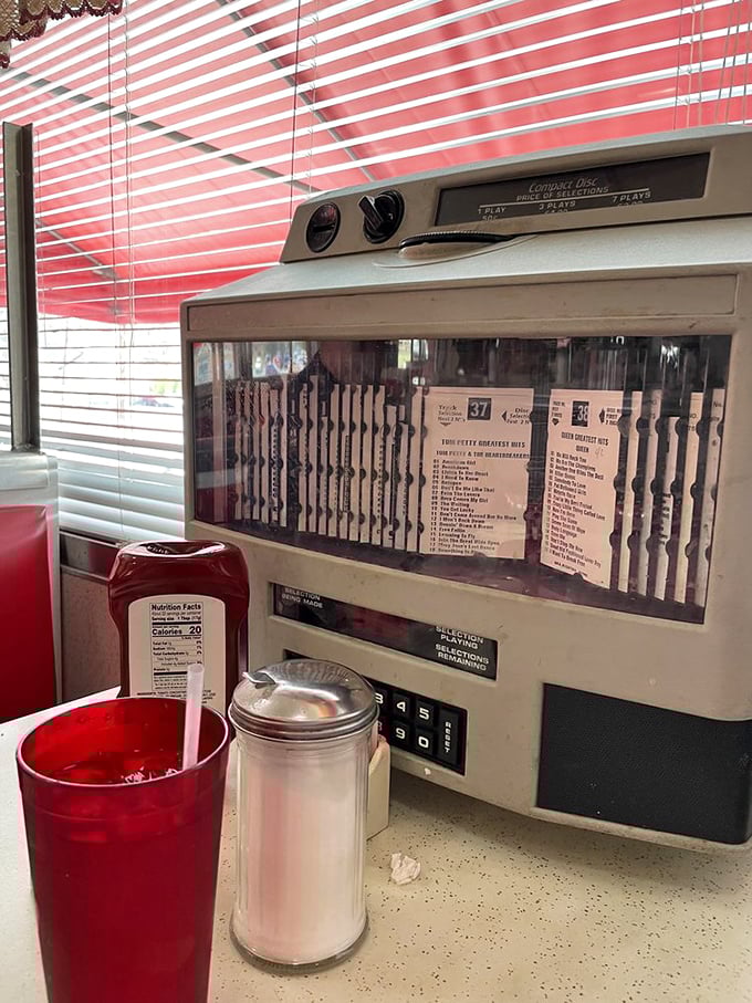 The tabletop jukebox—silent witness to first dates, family celebrations, and truckers' tales since before TikTok was even a concept.