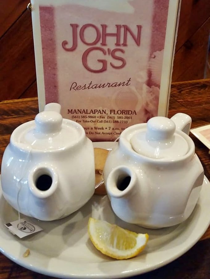 Tea service that brings civility to mealtime. Those white pots aren't just containers—they're vessels of calm in a chaotic world.