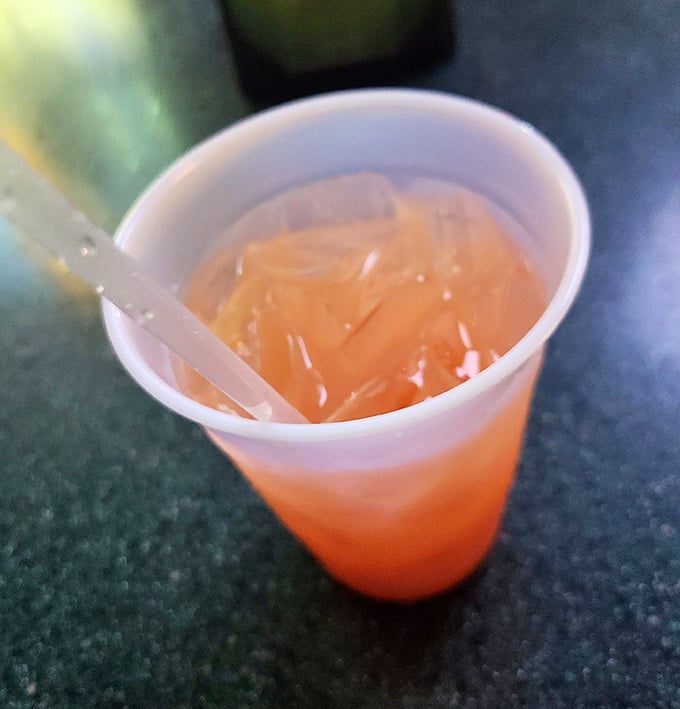 This tequila sunrise isn't just a drink—it's liquid sunshine in a cup, promising good times and questionable dance moves.