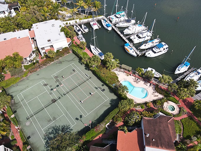 The boater's dream: Tennis courts and swimming pools just steps from your dock—because Florida understands balance.