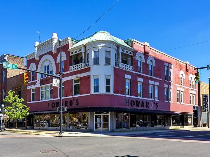 Howard's corner building stands proudly at the intersection, its vintage signage a reminder of when downtown was everyone's shopping destination.