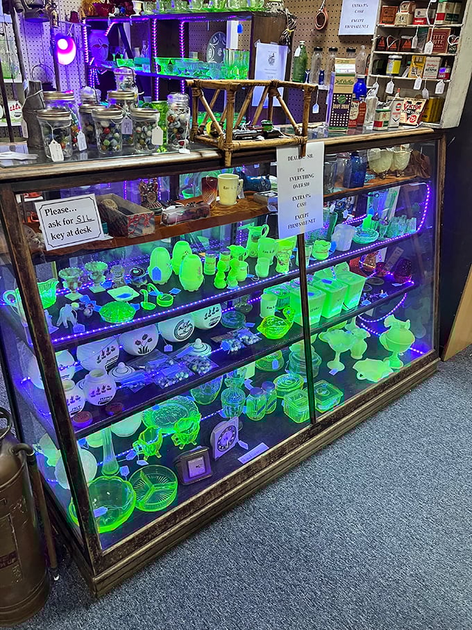 Under purple lights, uranium glass glows with otherworldly charm—everyday objects transformed into something magical with the flip of a switch.