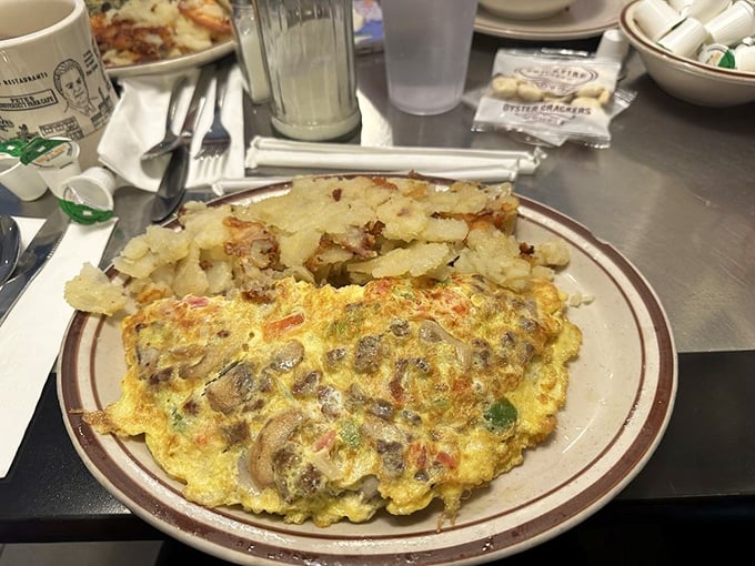 This omelette contains more vegetables than most people eat in a day. Fluffy eggs cradle a garden's worth of goodness.