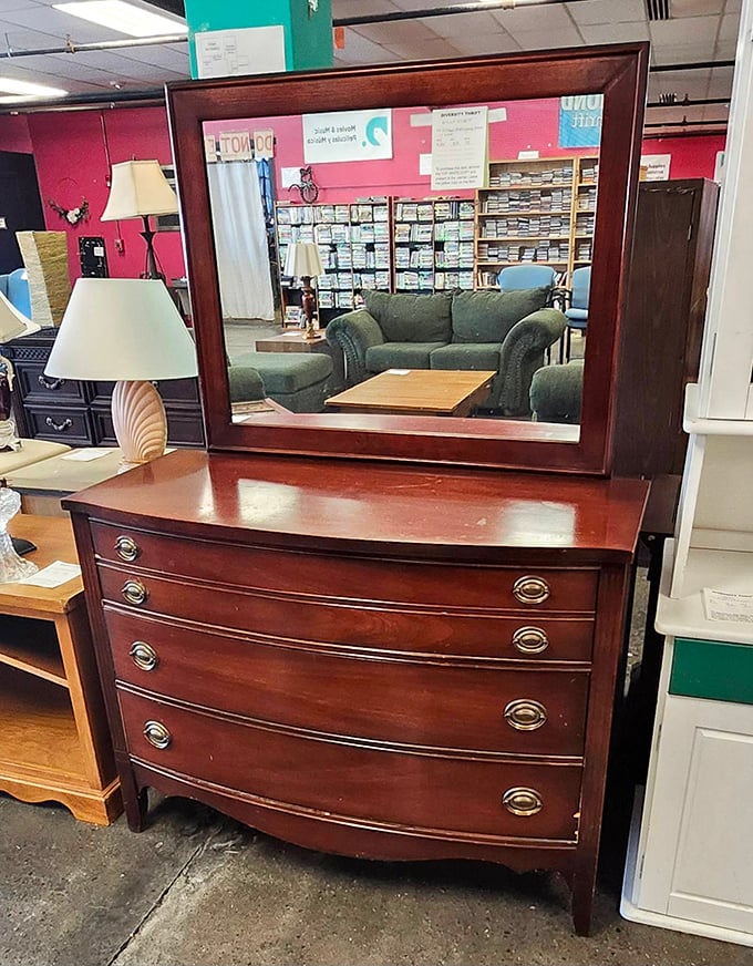 This mahogany dresser with mirror doesn't just reflect your image—it reflects an era when furniture was built to become family heirlooms.