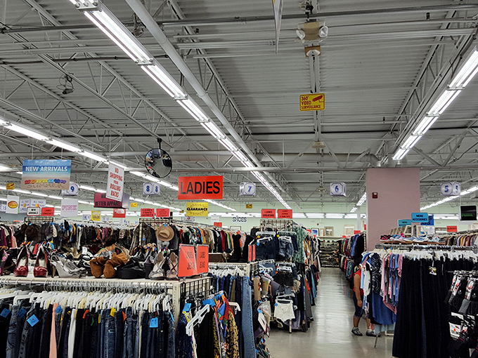 The ladies' section stretches toward the horizon, where vintage blouses and modern basics coexist in a democracy of fashion possibilities.