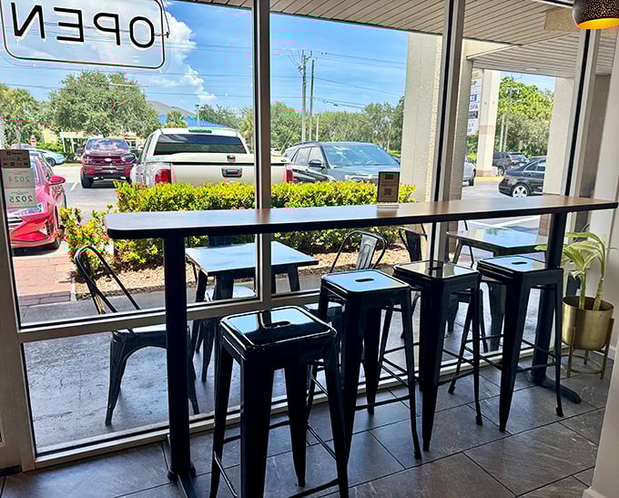Window seats offer prime people-watching with your meal – a free side of entertainment with every order.