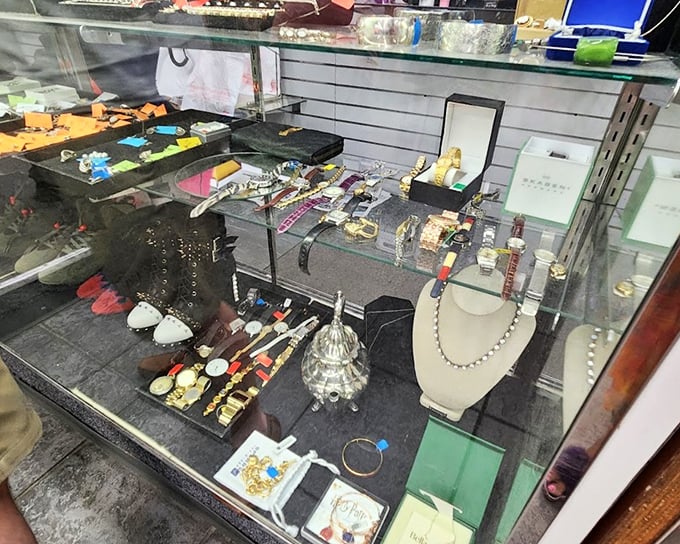Behind glass, costume jewelry sparkles with possibilities. These accessories once completed someone's perfect outfit and are ready to complete yours.