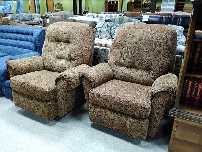 These recliners have seen thousands of football games and afternoon naps, now waiting for their next devoted sitter.