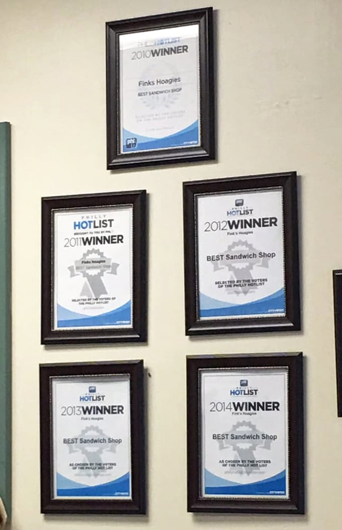 The wall of awards isn't just decoration—it's a timeline of sandwich excellence that spans years of consistent quality and dedication to the craft.