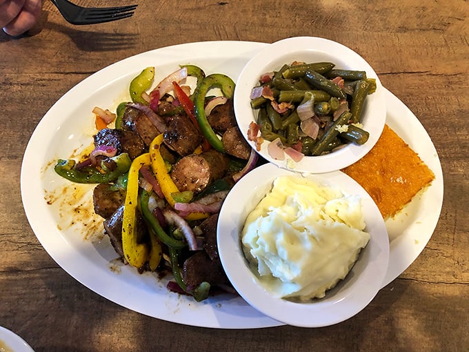 Sausage and peppers with all the fixings—proof that barbecue joints can venture beyond the standards without losing their soul.