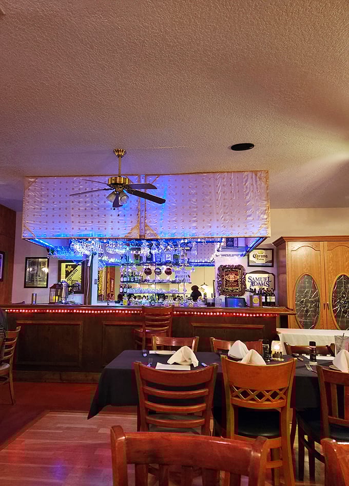The bar glows with the promise of perfectly mixed old-fashioneds and new friendships—liquid courage before tackling the Cowboy cut.