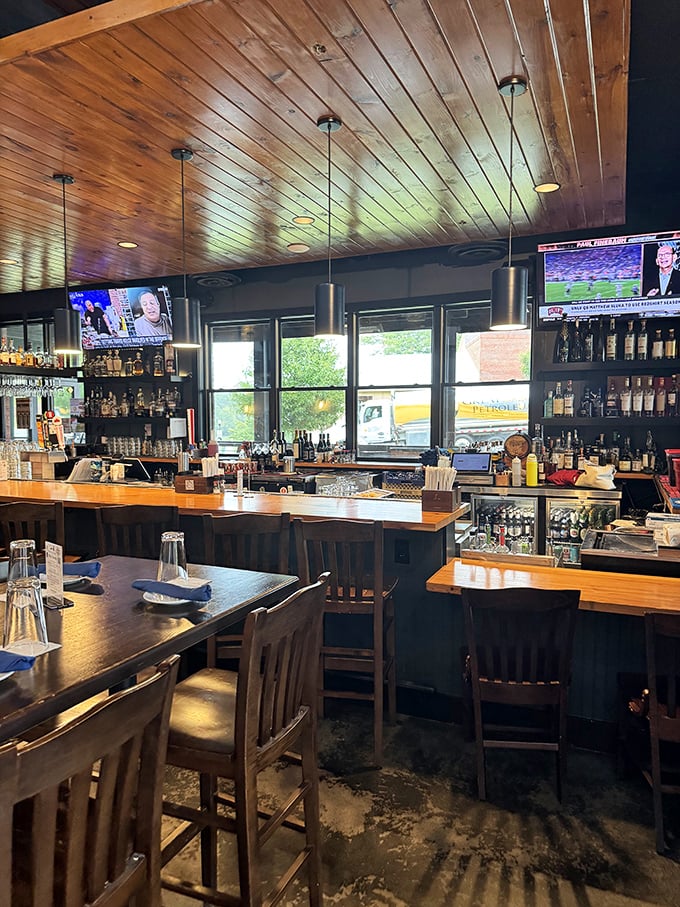 The bar doesn't just serve drinks—it serves as command central for an evening of culinary exploration and occasional over-ordering.