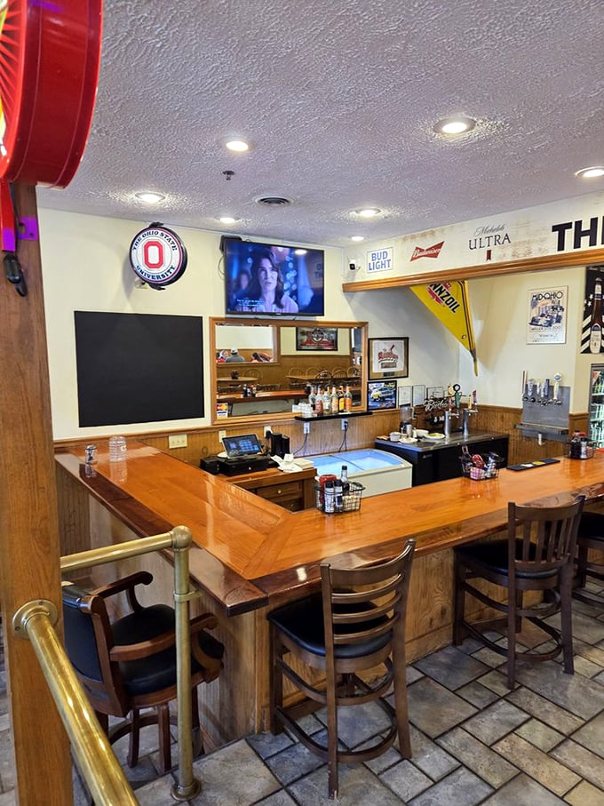 A bar that prioritizes function over flash. No mixologists in sight—just honest pours, cold drafts, and the game always on TV.