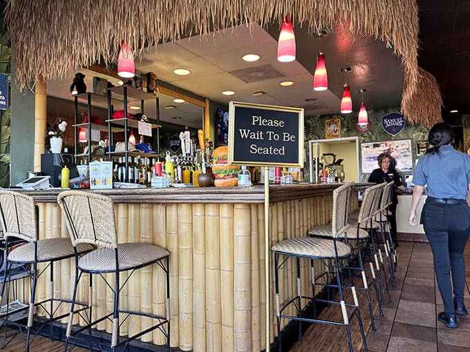 Pink pendant lights dangle from thatched overhangs like tropical fruit. Even the lighting here makes you hungry for adventure.