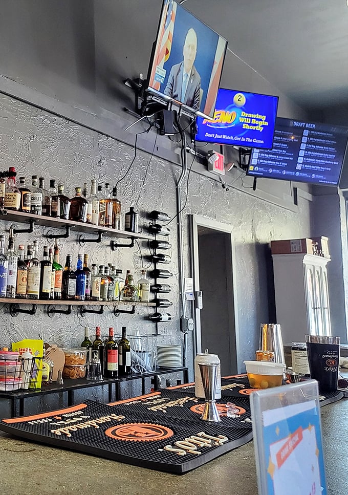 Behind every great meal is a bar stocked with possibilities. The industrial pipe shelving displays bottles like trophies from around the world.