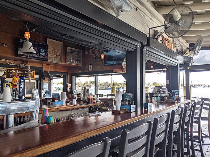 The bar offers waterfront views and cold drinks – perfect for watching boats and contemplating life.