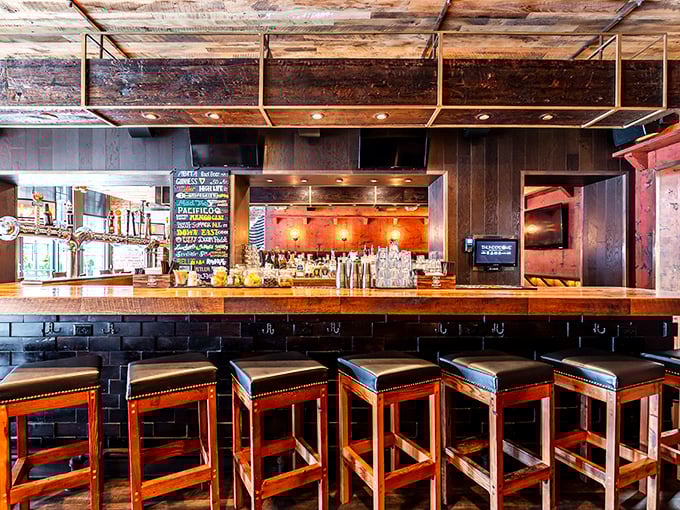 The bar at The Eagle doesn't just serve drinks—it creates liquid alibis for ordering another round of those addictive hush puppies.