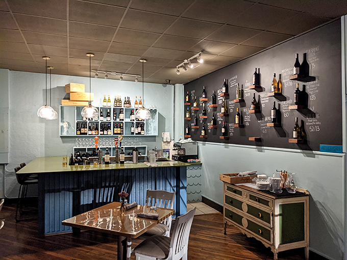The bar wall displays bottles like trophies of taste. This isn't just where drinks are made—it's where memories begin.