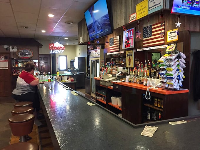 A bar that doesn't need mixologists or fancy cocktails – just cold beer, friendly faces, and the American flags that remind you exactly where you are.