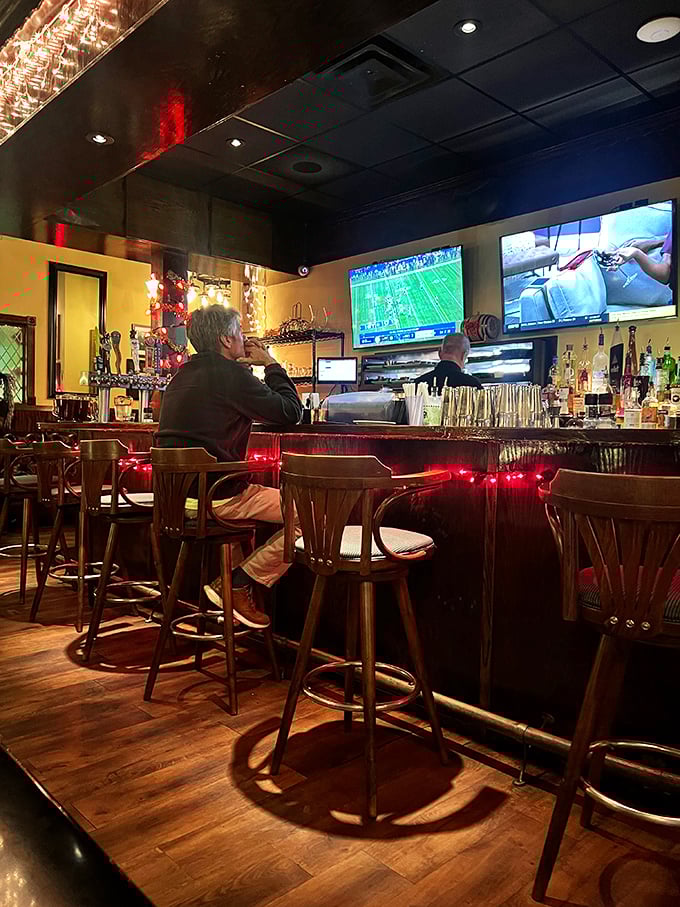 The bar scene offers front-row seats to both mixology magic and whatever game is on—proving that sometimes the best dining companions are strangers with excellent taste in bourbon.