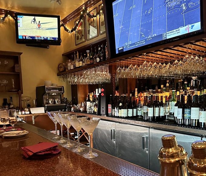 A bar stocked for serious decisions—where martinis are measured in smiles and horse races are watched with bated breath.