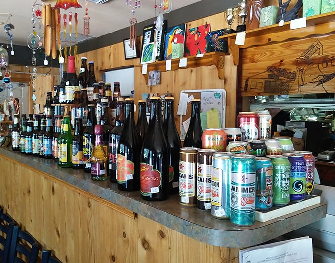 The bar area invites lingering conversations over cold drinks and the day's smoky barbecue specials.