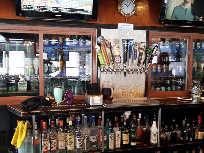 Behind the bar, taps stand ready while bottles wait patiently – liquid reinforcements for stories that get better with each round.
