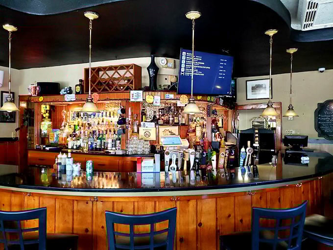 A bar stocked for every occasion, from celebration to consolation. The wooden bar front has absorbed decades of elbows, stories, and Wisconsin winters.