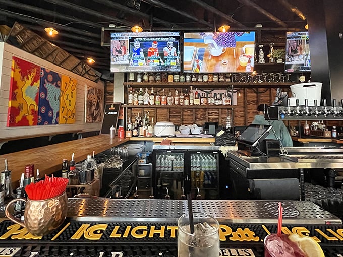 Behind the bar at Walter's, where the selection of spirits rivals the selection of woods used in their smoker—both carefully chosen for maximum flavor impact.