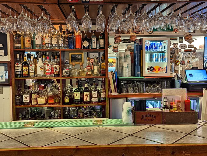 The bar at Margie & Ray's doesn't need fancy mixologists – just well-stocked shelves and bartenders who know the difference between tourists and regulars.