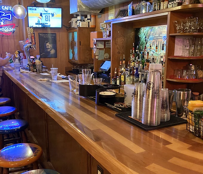 The bar gleams with promise – cold beer and hot food, the eternal beach town equation for happiness.