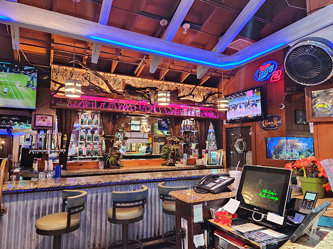 The bar isn't just serving drinks—it's dispensing liquid sunshine with a side of sports and friendly banter.