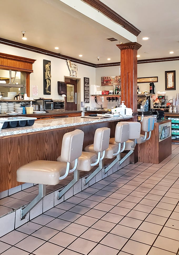 Classic diner counter seating—where solo diners feel right at home and regulars have their "spots" that servers know by heart.