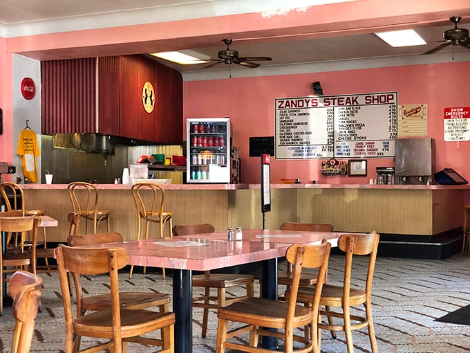 The counter view offers dinner and a show—watch sandwich artistry in action as orders are called and culinary magic unfolds.