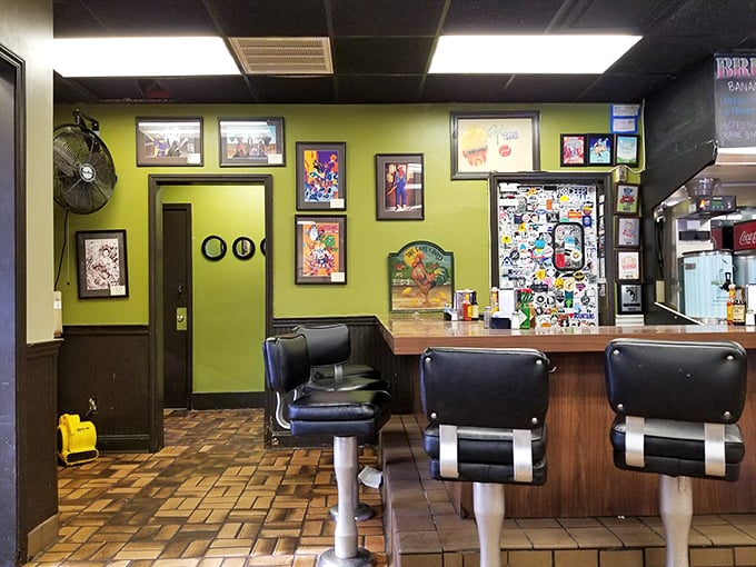 The lime green wall pops against vintage counter seating, creating a space that's both retro and refreshingly current. Diners aren't just preserved here—they're reimagined.