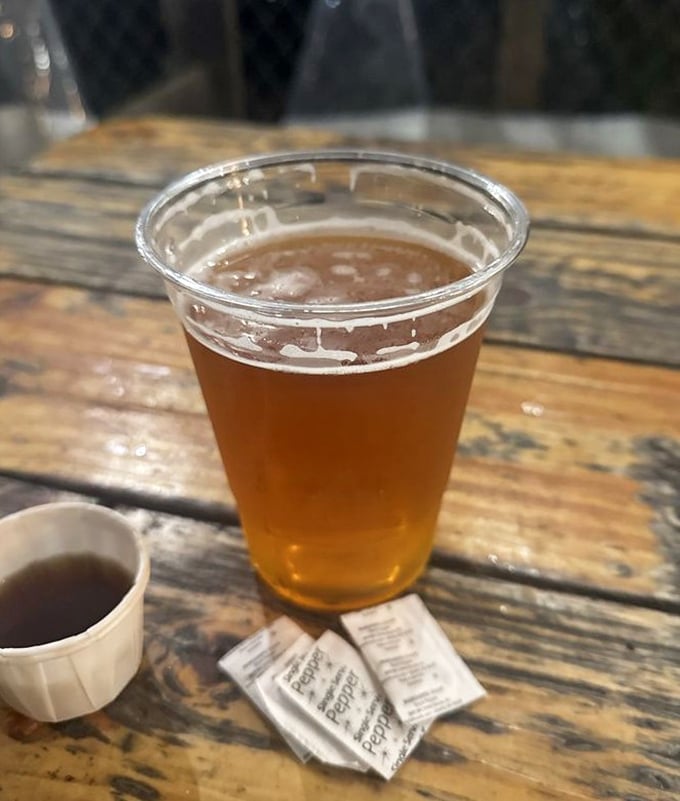 Cold beer in a plastic cup—the perfect companion for seafood that just left the ocean. Simple pleasures are often the most profound.