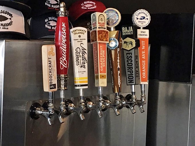 Local craft beers on tap stand ready to complement your seafood feast—liquid gold to pair with ocean treasures.
