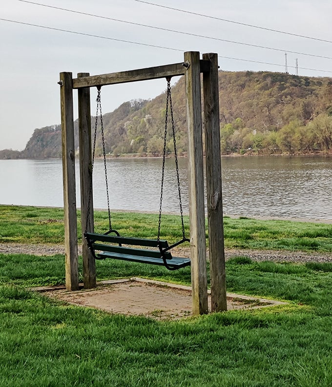 This riverside swing isn't just a seat—it's front-row tickets to nature's greatest show, with the river and Blue Hill as headliners.