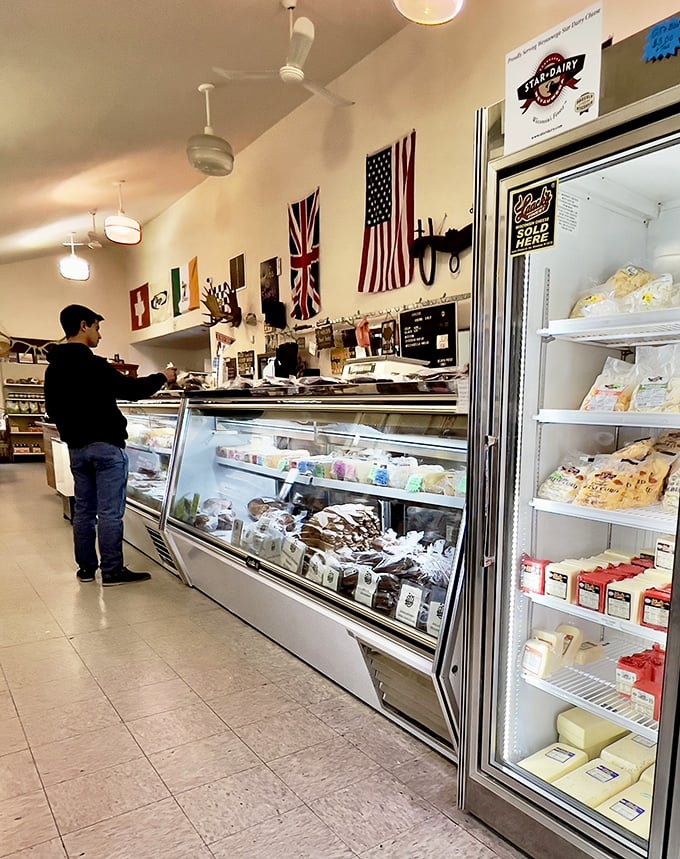 The customer contemplation moment – when you realize you want more than your cooler can hold. A beautiful dilemma at the meat counter.