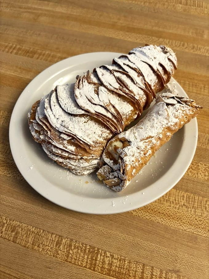 The cannoli and lobster tail—Italian pastry royalty holding court in a humble box, waiting to transform an ordinary day into a celebration.