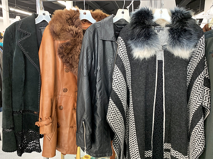 Leather jackets and fur-trimmed coats hang like trophies, each one whispering tales of glamorous nights and winter adventures past.