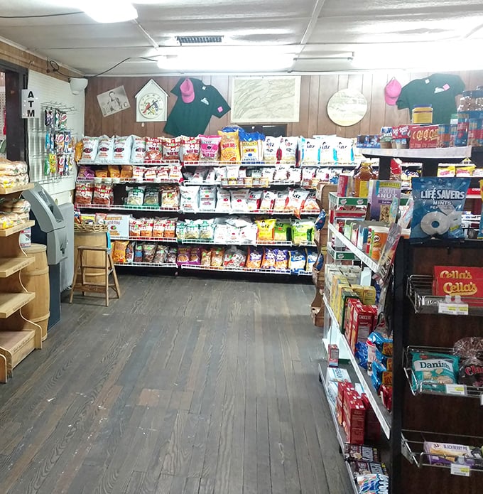 Shelves stocked with life's necessities—from snacks to staples. The wooden floors have supported generations of hungry shoppers.