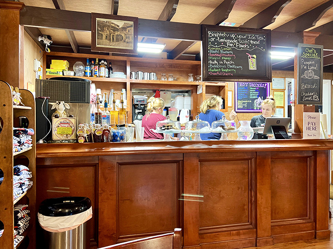 Behind this wooden counter, culinary magic happens daily, transforming simple ingredients into German-inspired masterpieces.