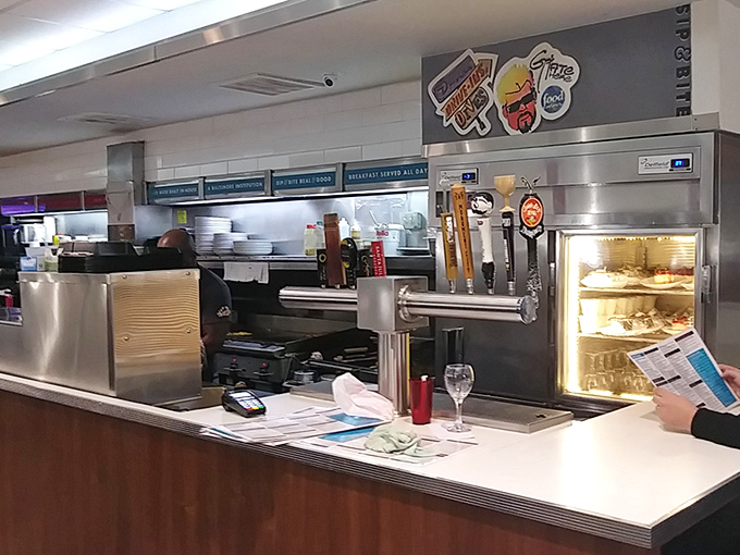 The beating heart of any great diner – a counter where solo diners find community and the kitchen ballet unfolds before hungry eyes.