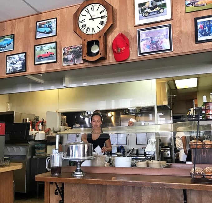Where breakfast magic happens, complete with pendulum clock keeping time. The open kitchen says, "We've got nothing to hide—just good food to share."
