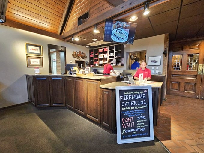 At this counter, BBQ dreams come true while staff in matching red shirts orchestrate your journey into smoked meat paradise.