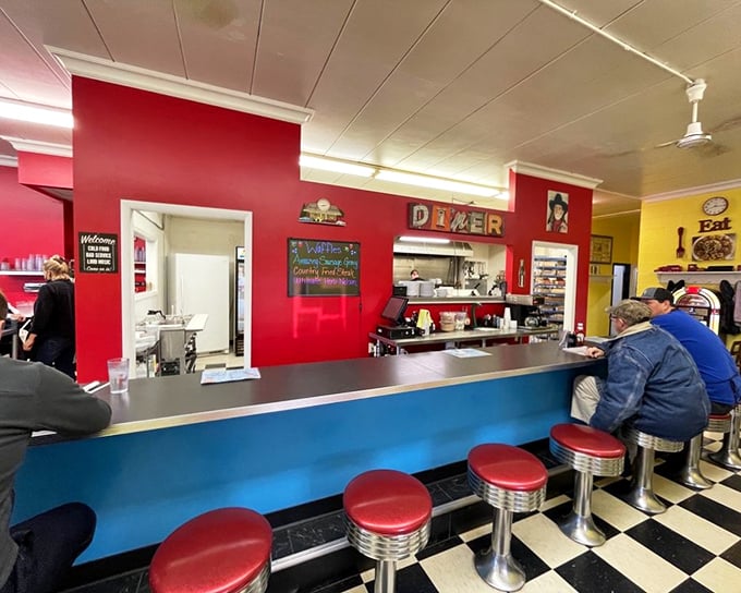 The counter isn't just seating—it's front-row tickets to the breakfast theater, where short-order cooks perform culinary magic without a net.