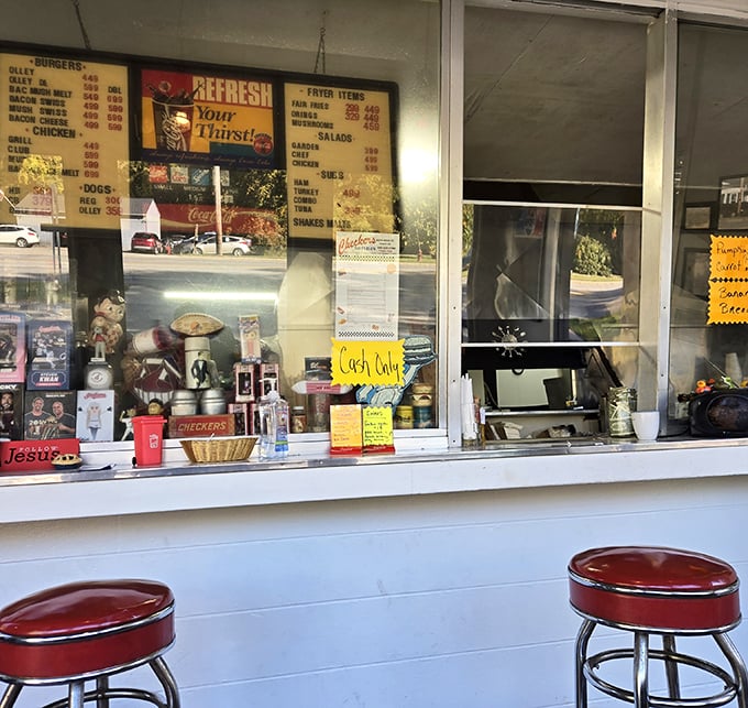 The ordering counter—where hopeful customers lean in, cash in hand, ready to participate in one of America's most sacred food rituals.